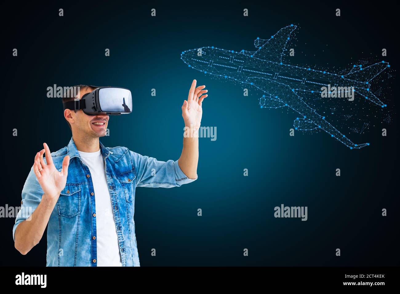 Man wearing virtual reality goggles. plane Stock Photo - Alamy