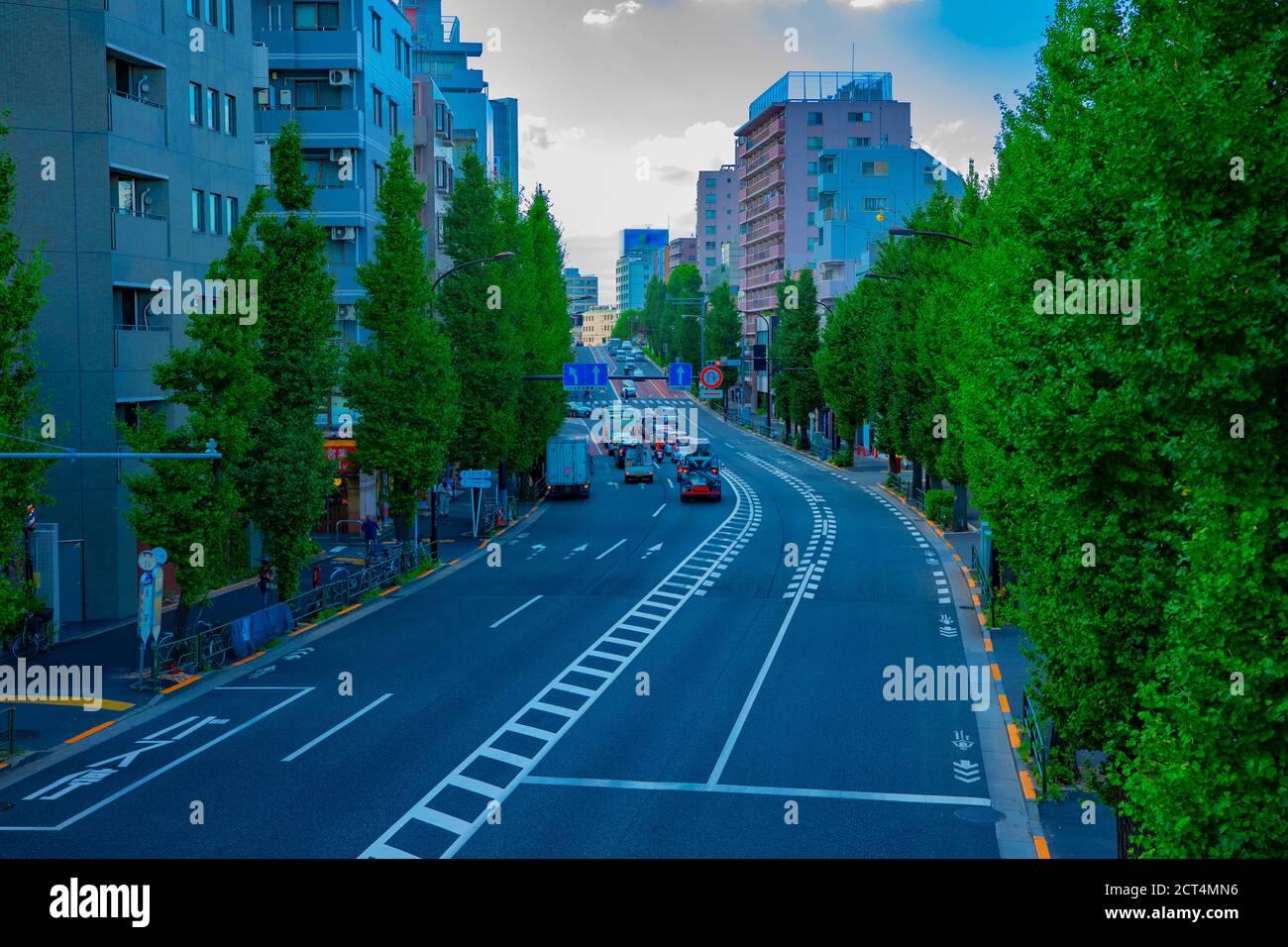 A city street at Oume avenue in Tokyo daytime wide shot Stock Photo - Alamy