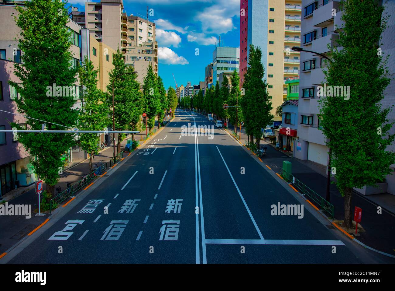 A city street at Oume avenue in Tokyo daytime wide shot Stock Photo - Alamy