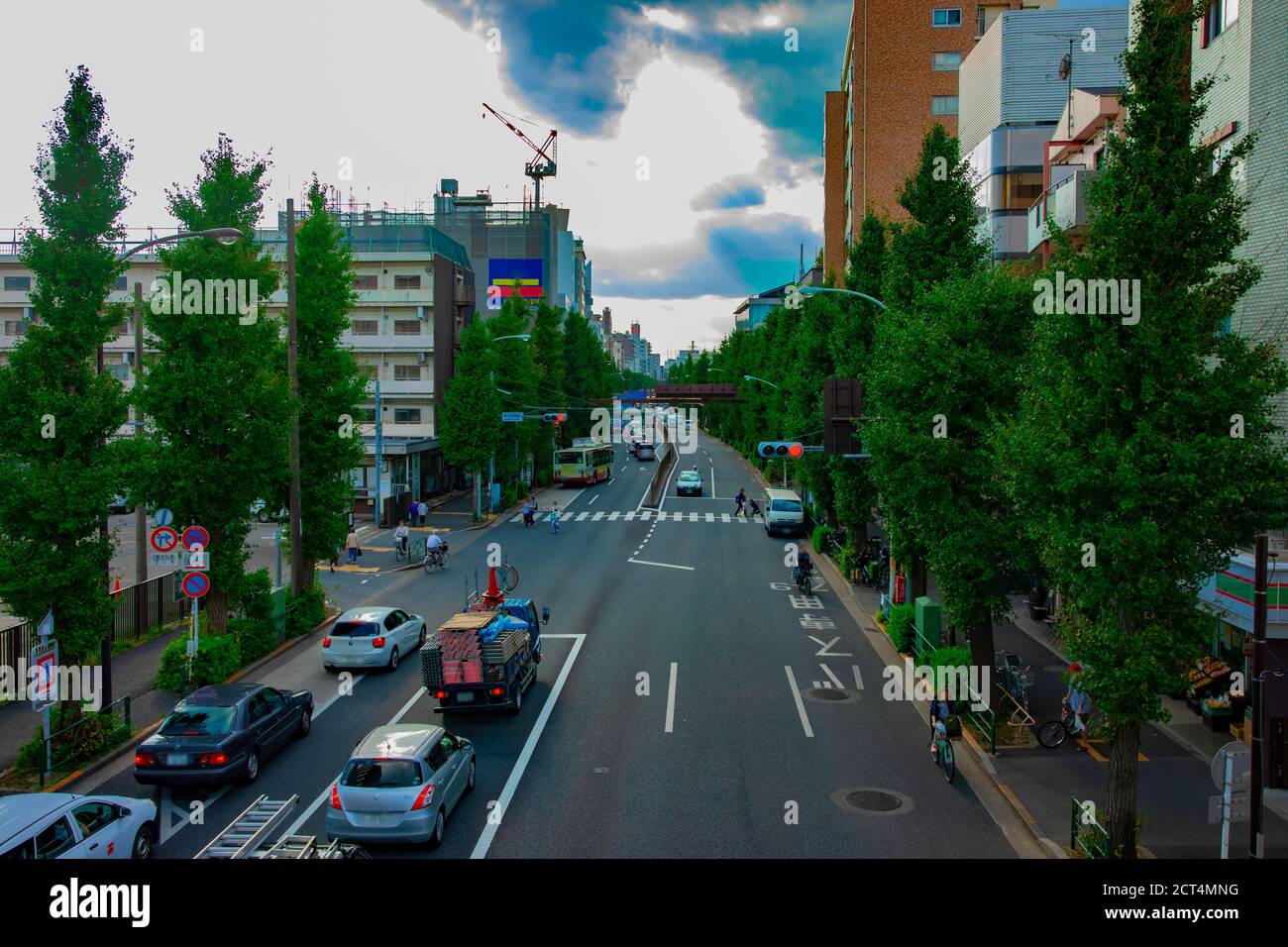 A city street at Oume avenue in Tokyo daytime wide shot Stock Photo - Alamy