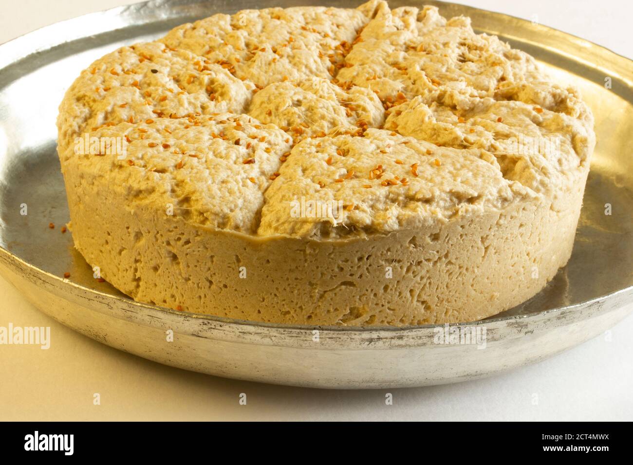 traditional turkish tahini halva in plate Stock Photo - Alamy