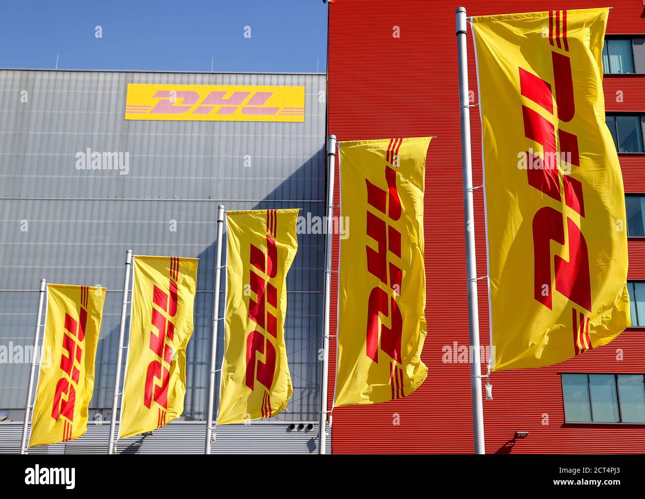 Schkeuditz, Germany. 29th July, 2020. Flags of DHL are flying in front ...