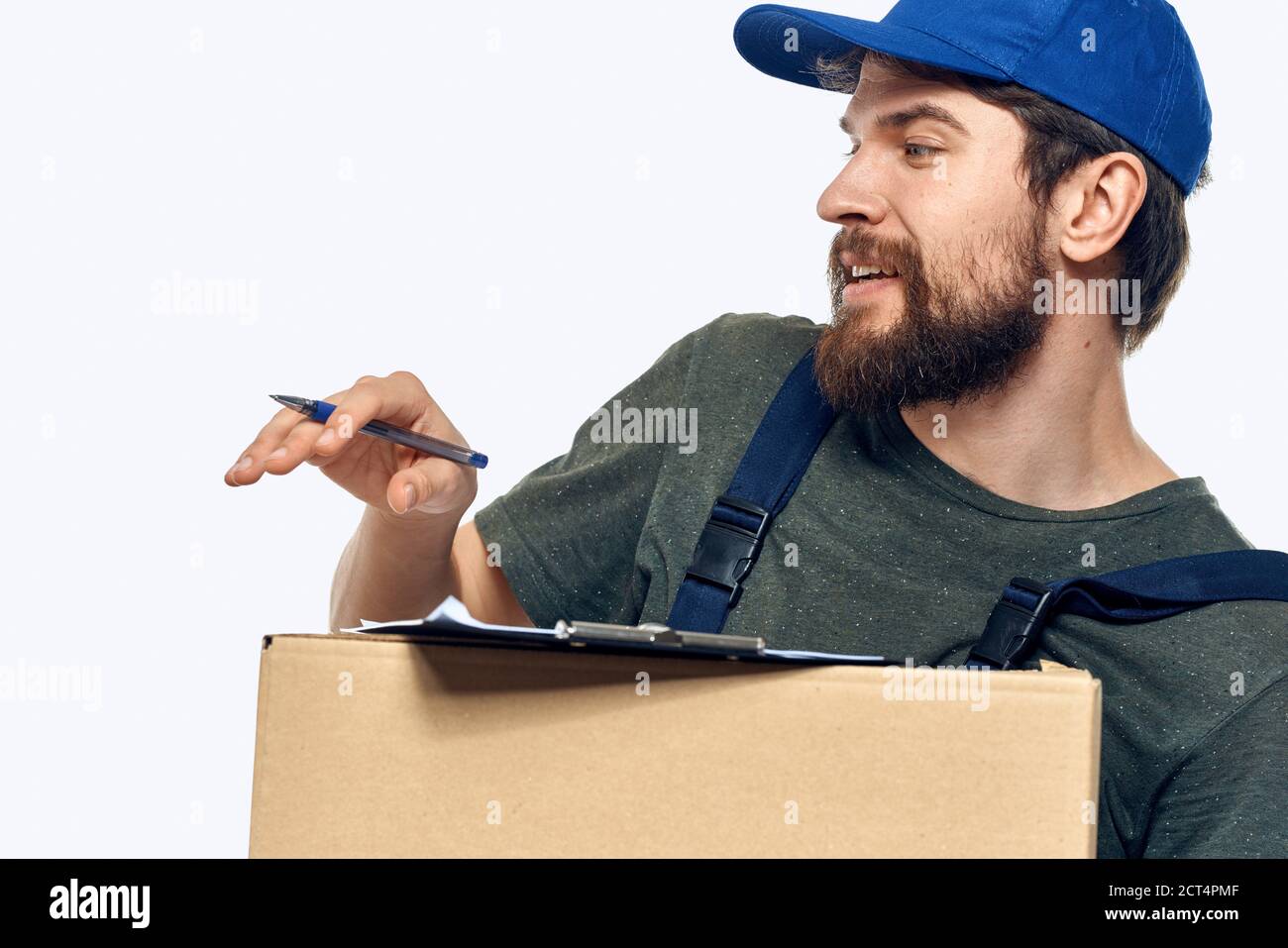 Working male courier with box in hand documents delivery service light ...