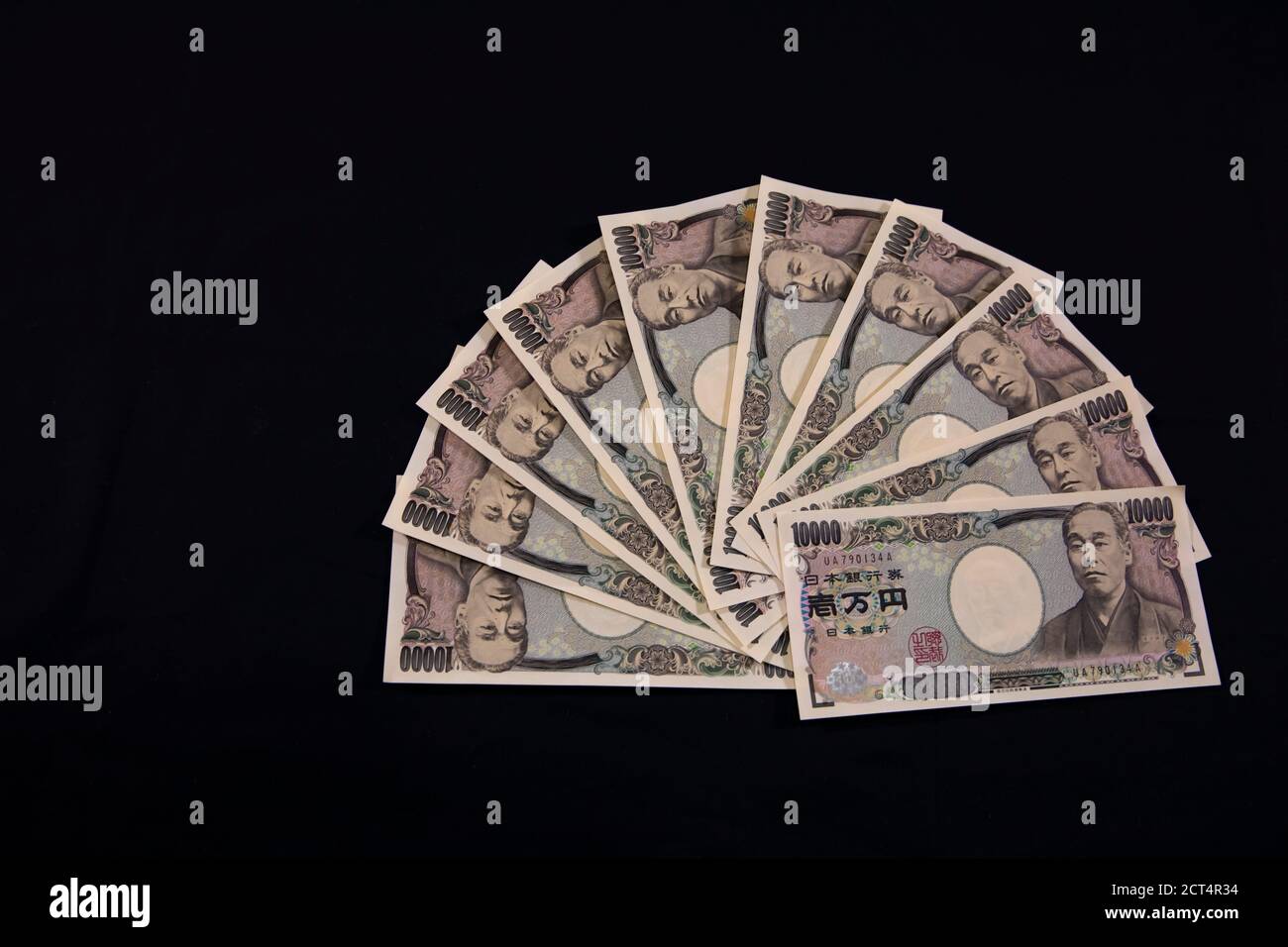 Japanese currency 100,000 yen on the black background copyspace Stock ...