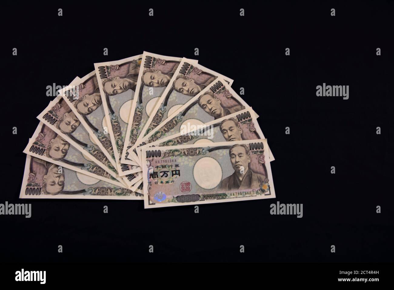 Japanese currency 100,000 yen on the black background copyspace Stock ...
