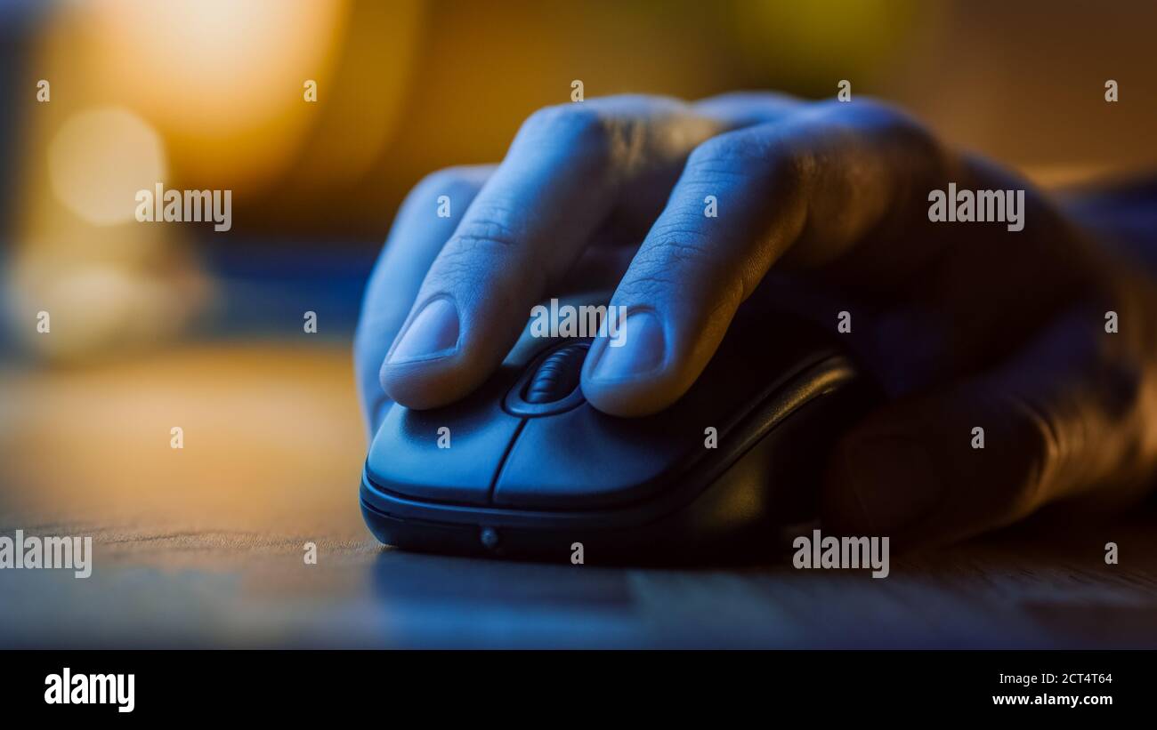 Close up of a persons hand on a computer mouse hi-res stock photography ...