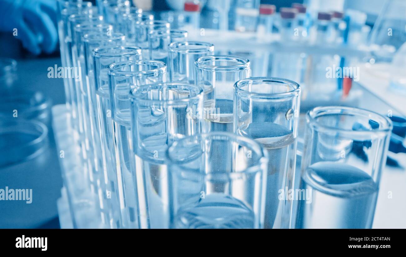 Scientific Laboratory: Pipette Dropping Liquid into Test Tubes, Medical ...