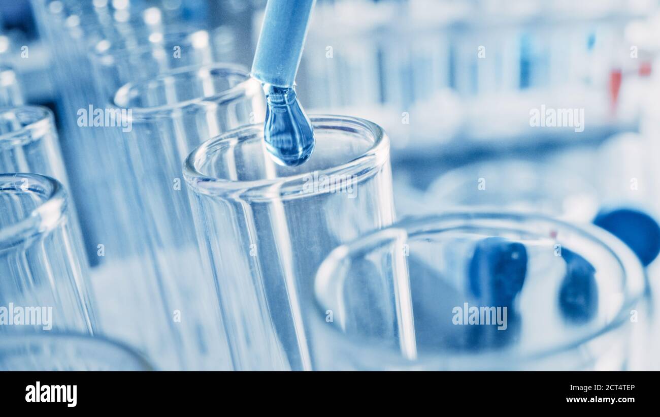 Scientific Laboratory: Pipette Dropping Liquid into Test Tubes, Medical ...