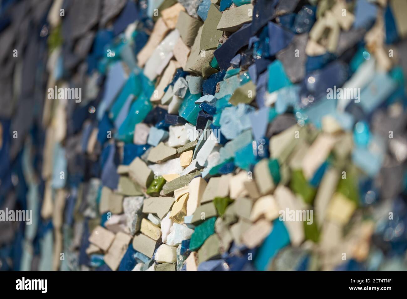 Mosaic stone wall of colours Stock Photo - Alamy