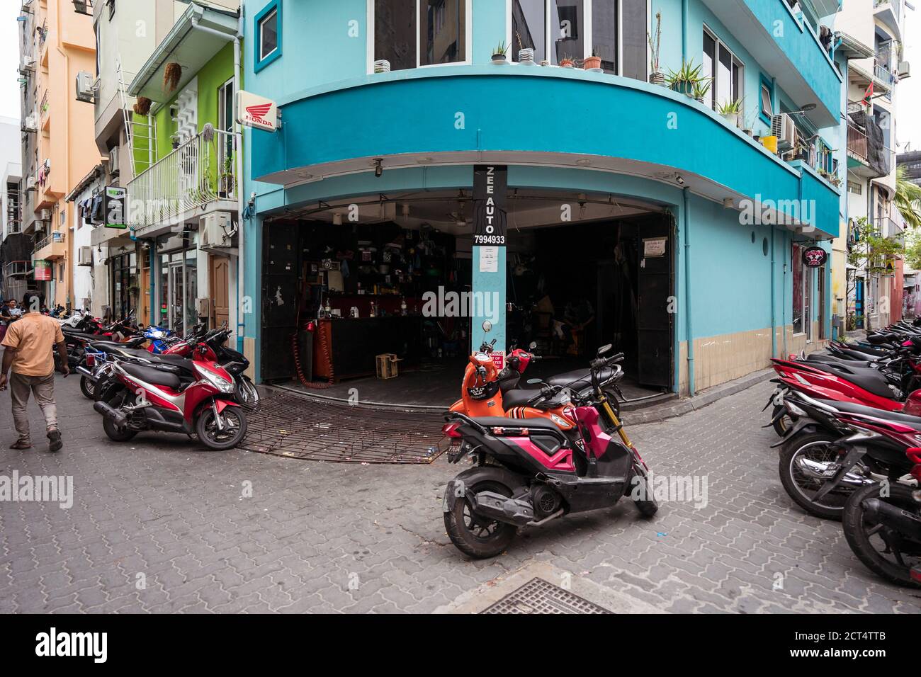 Male / Maldives - August 10, 2019: motorcycle repair shop entrance in ...