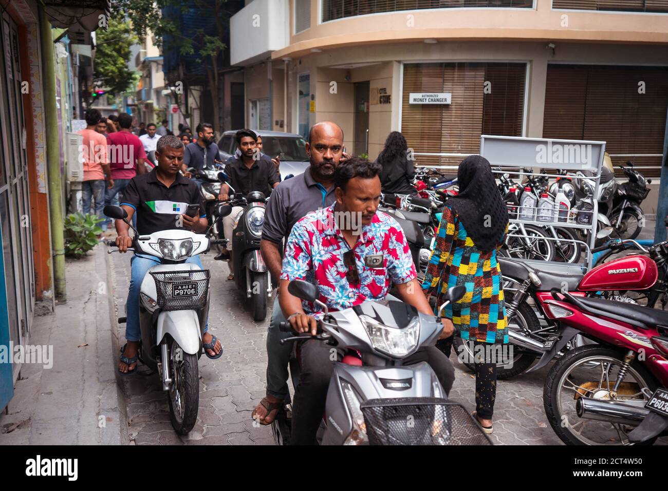 Male / Maldives - August 10, 2019: Muslim people riding motorcycles ...