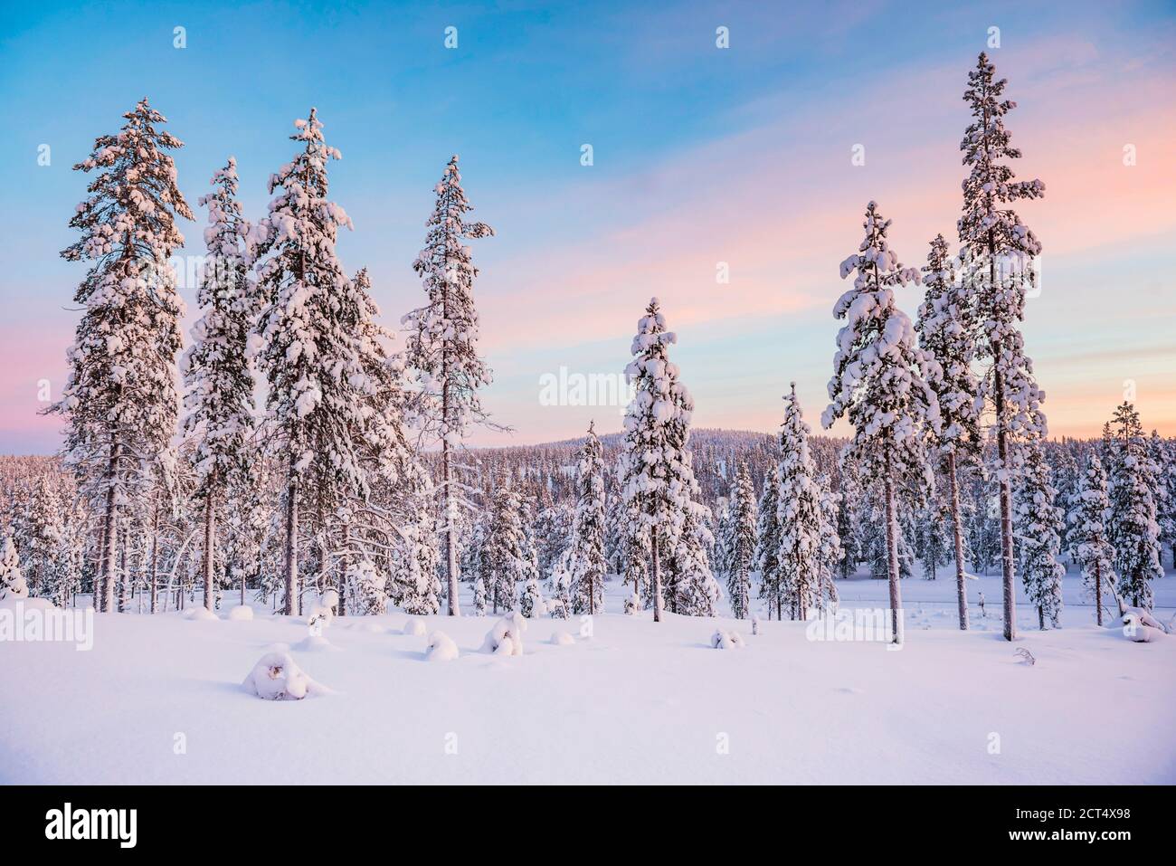 Cold snow covered icy winter landscape at sunset inside the Arctic ...