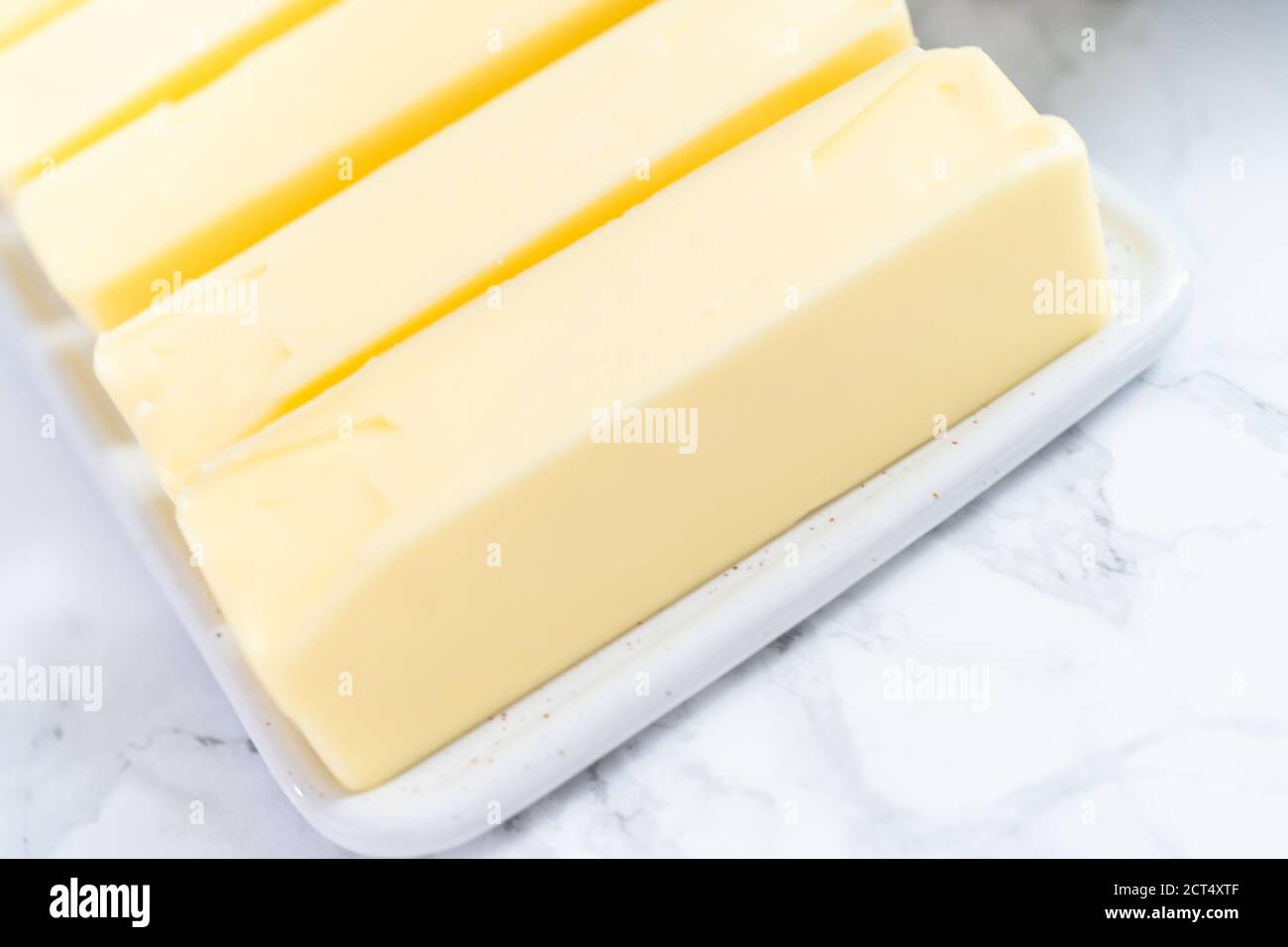 Sticks of butter at room temperature for baking Stock Photo - Alamy