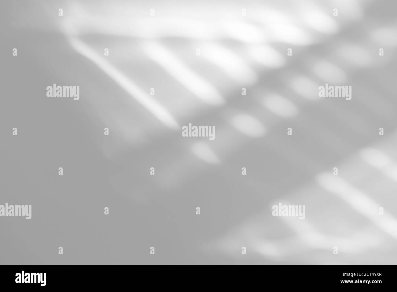 Organic drop shadow on a white wall Stock Photo - Alamy