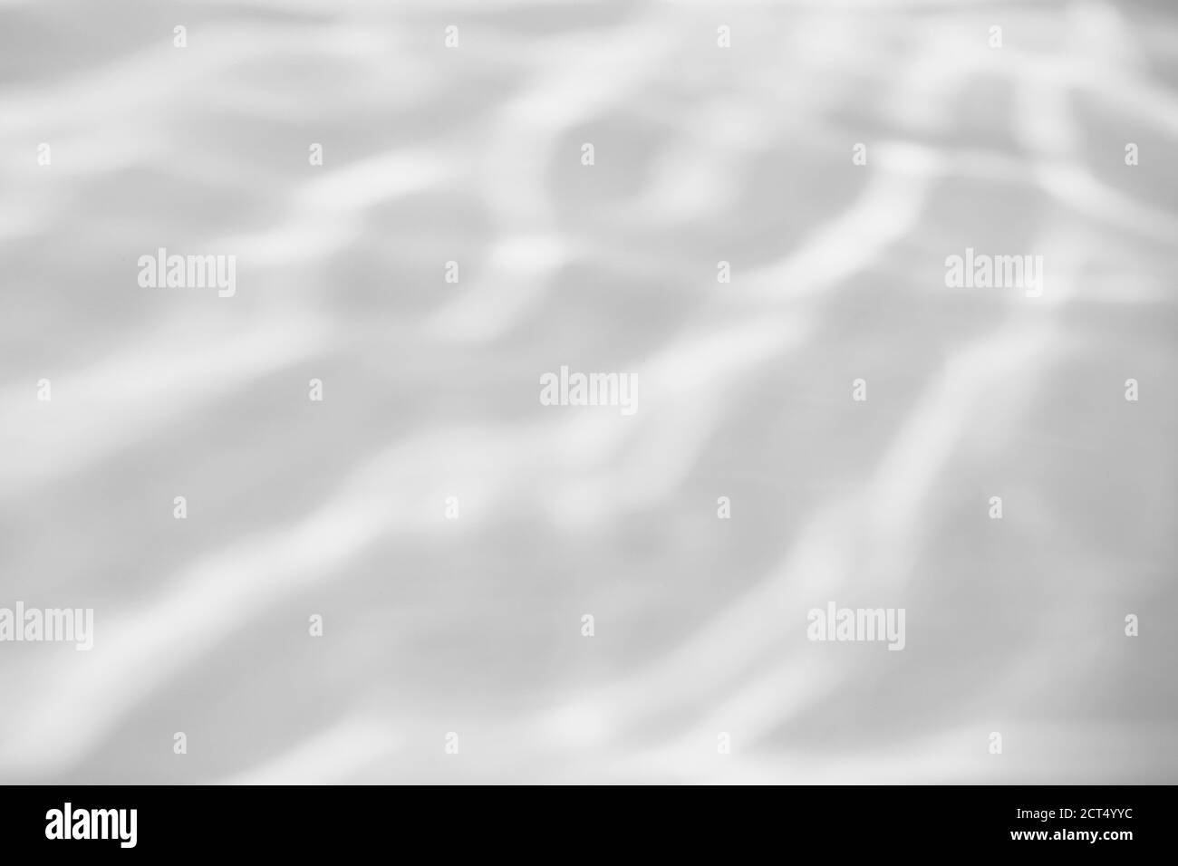 shadow and light caustic effect on a white wall Stock Photo - Alamy
