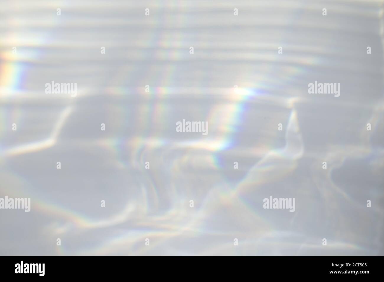 shadow and light caustic effect on a white wall Stock Photo - Alamy