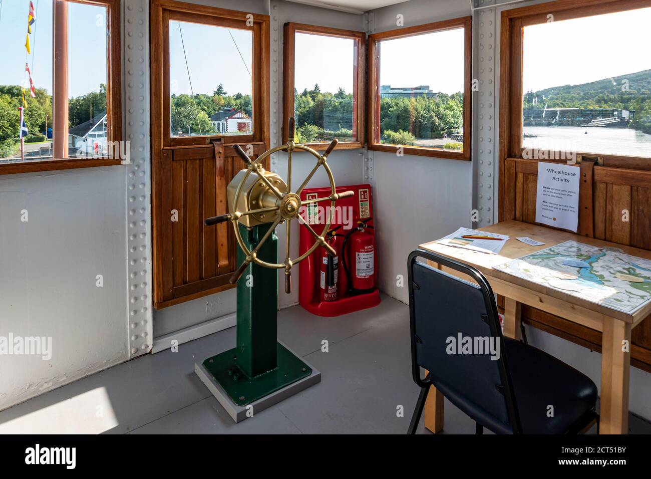 The wheel house of restored paddle steamer Maid of the Loch moored at ...