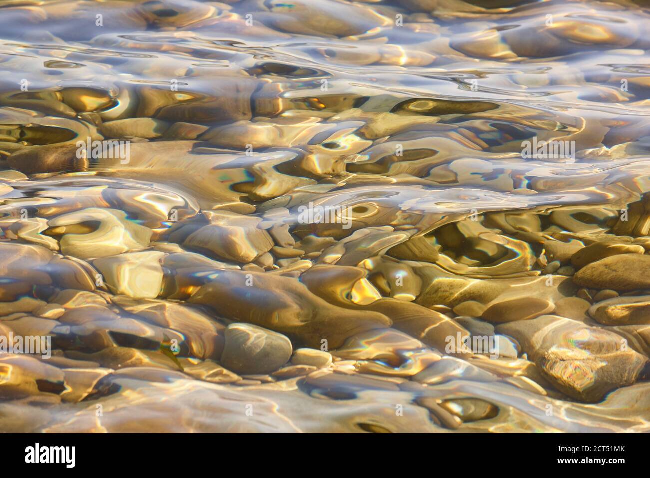 Pebble stone reflections on the water. Nature background. Zen ...