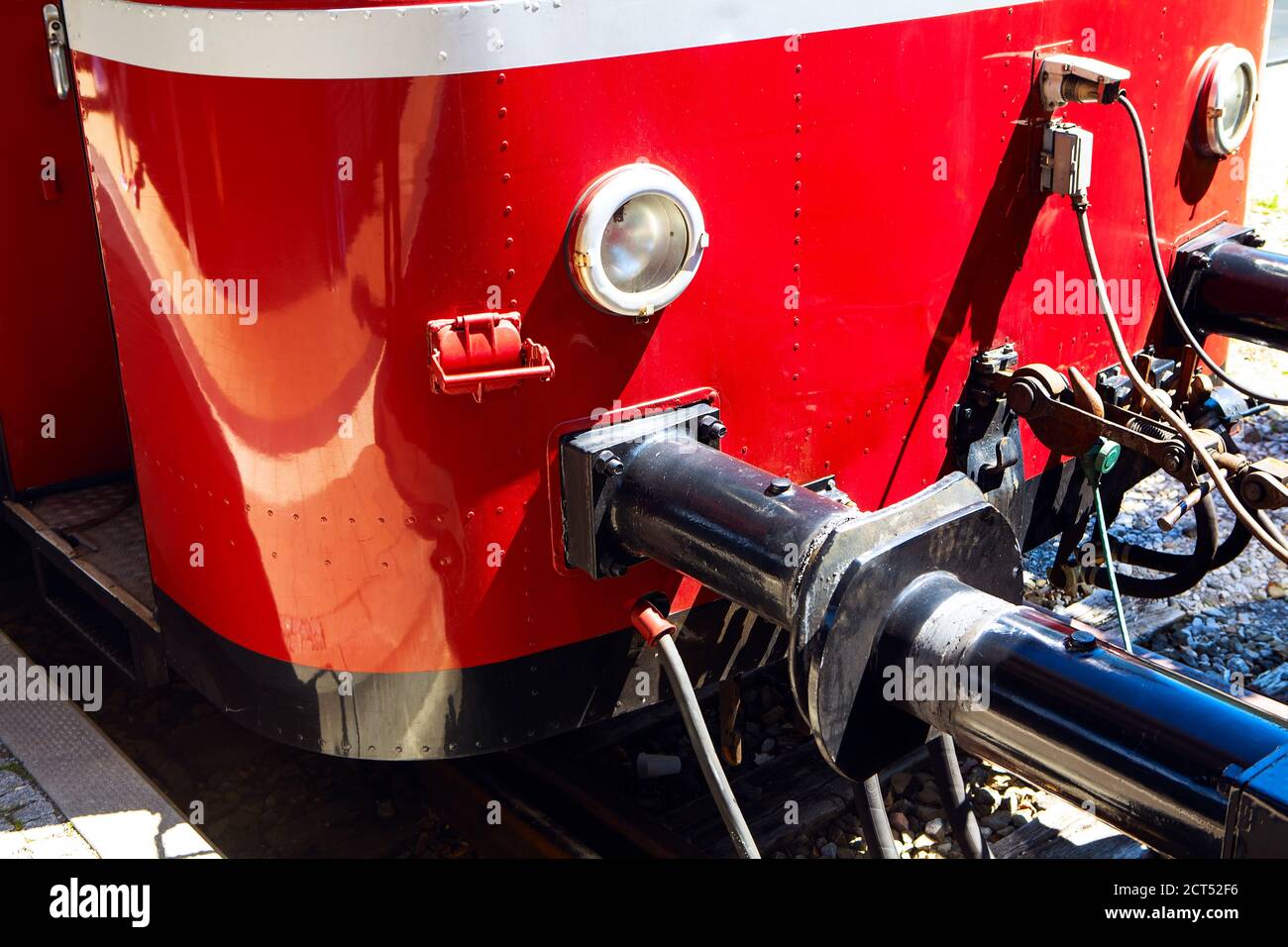Train wagon connection mechanism . Rear part of a red carriage Stock ...