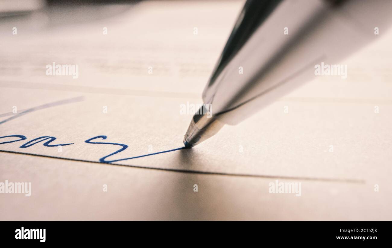 Person Signing Important Document. Camera Following Tip of the Pen as ...