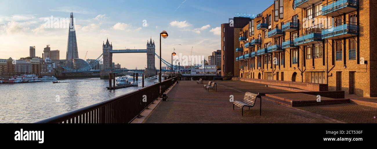 Tower Bridge and the Shard at sunset, seen behind the River Thames ...