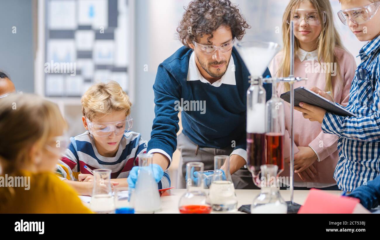 Elementary School Science Classroom: Enthusiastic Teacher Explains ...