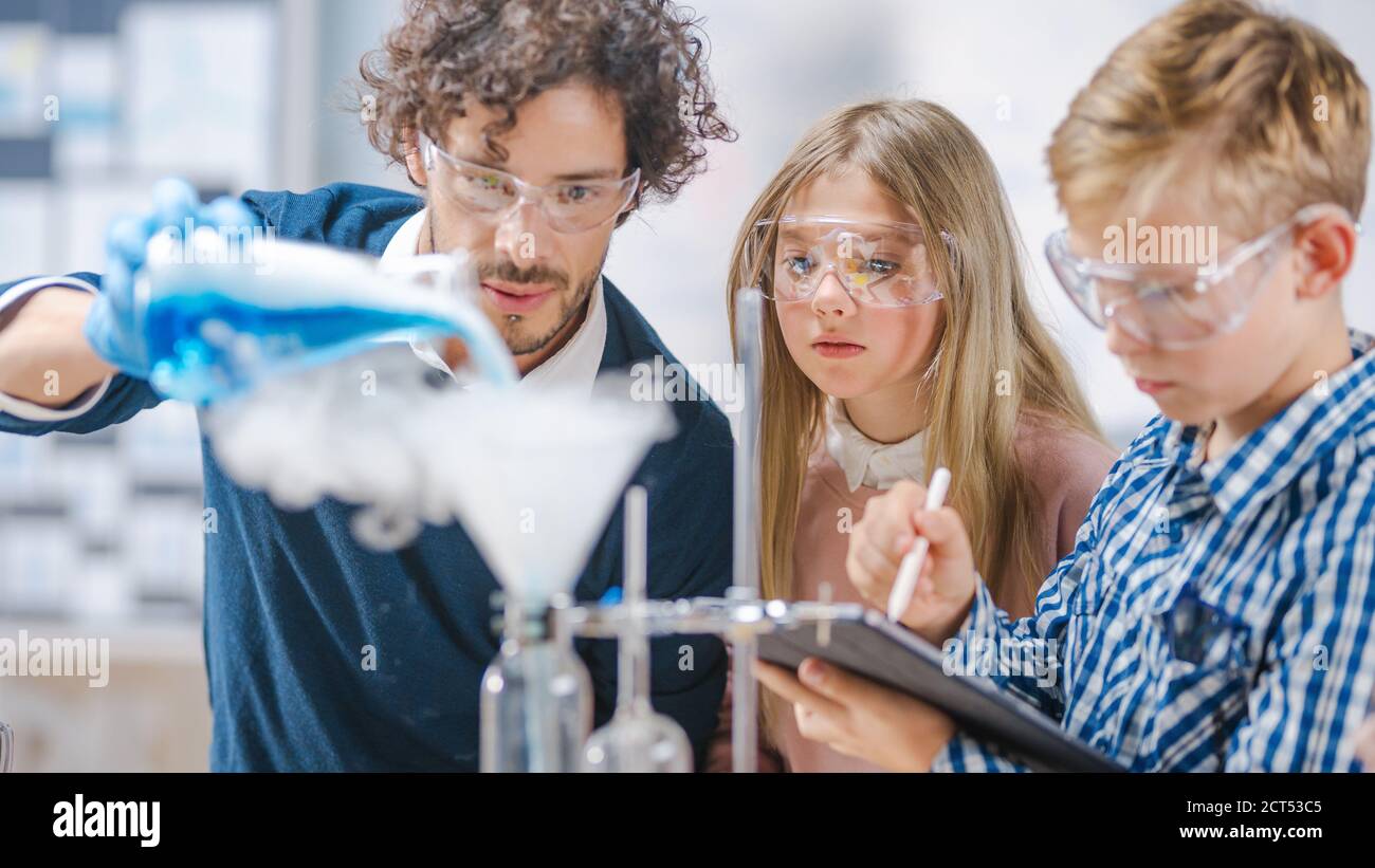 Elementary School Science Classroom: Enthusiastic Teacher Explains ...