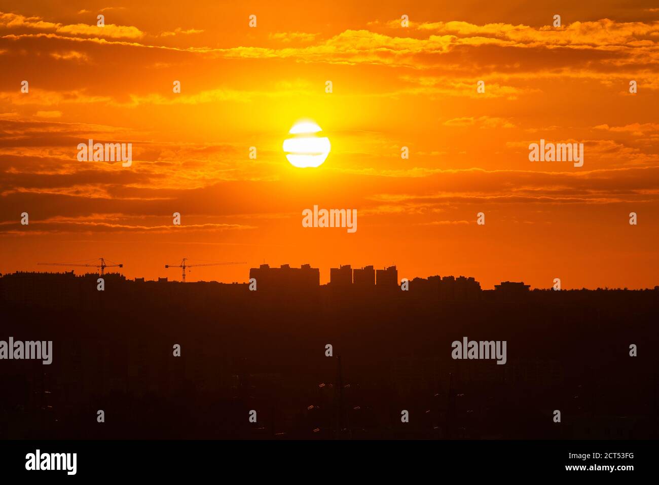A beautiful vibrant sunset in a city Stock Photo - Alamy