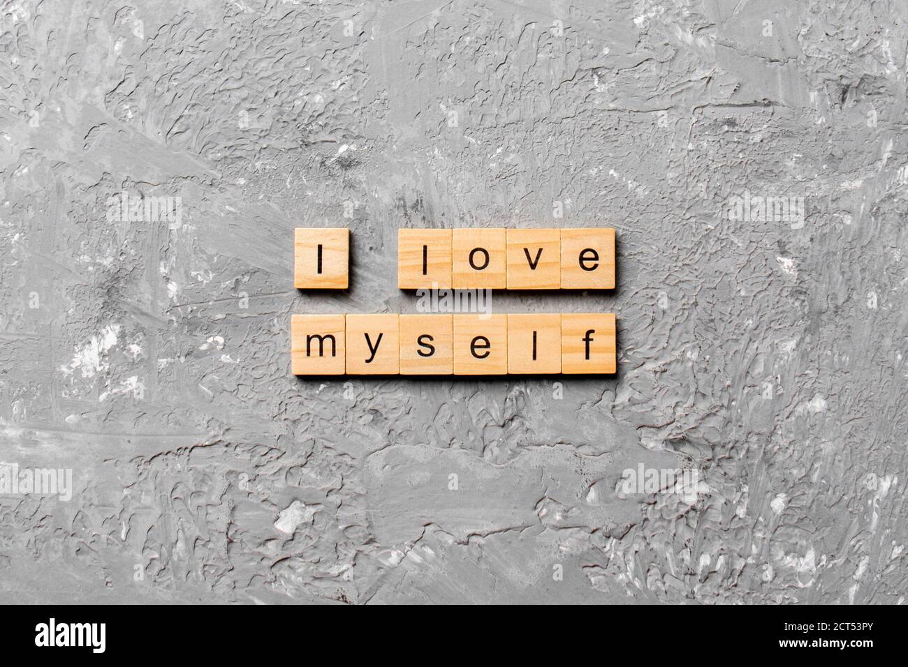 I Love myself word written on wood block. I Love myself text on cement ...