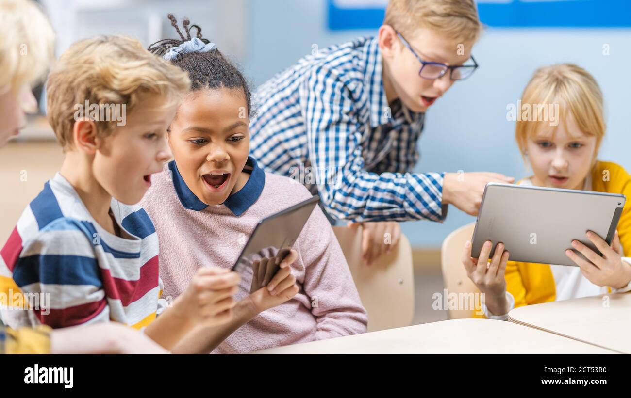 School Computer Science Class: Schoolchildren Use Digital Tablet ...