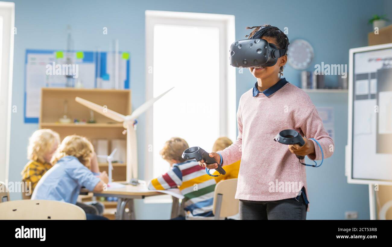 Elementary School Computer Science Class: Cute Girl Wearing Augmented ...