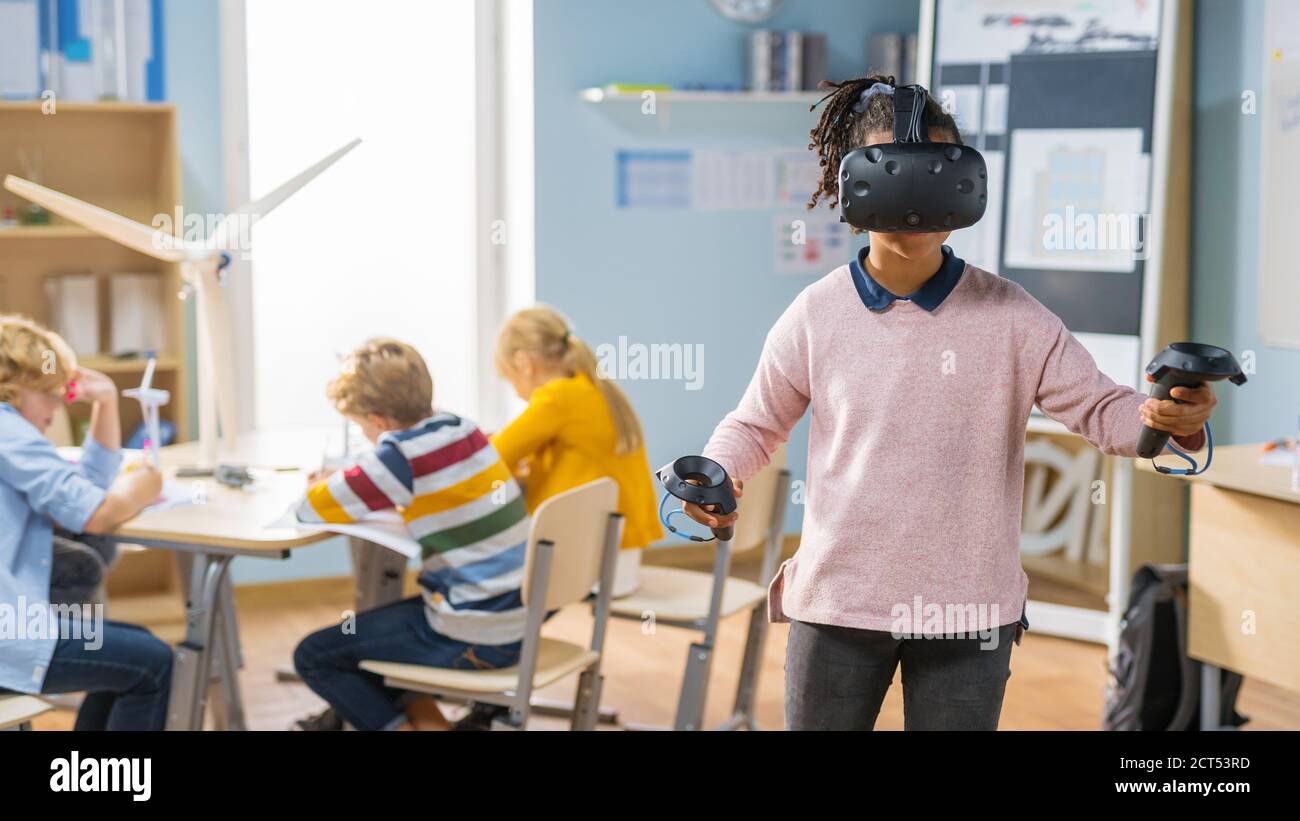 Elementary School Computer Science Class: Cute Girl Wearing Augmented ...