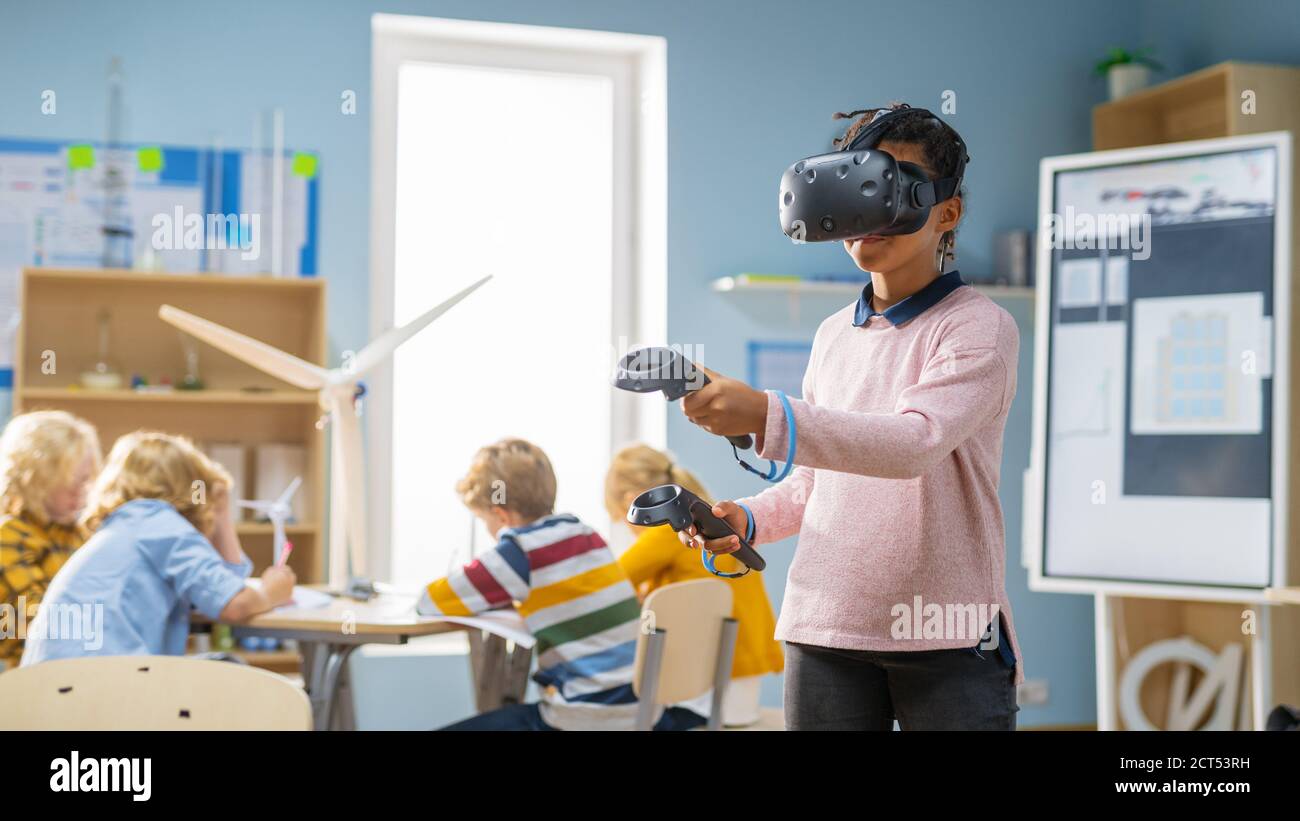 Elementary School Computer Science Class: Cute Girl Wearing Augmented ...