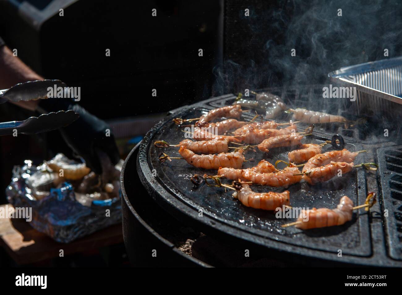 Professional cook prepares shrimps hi-res stock photography and images ...