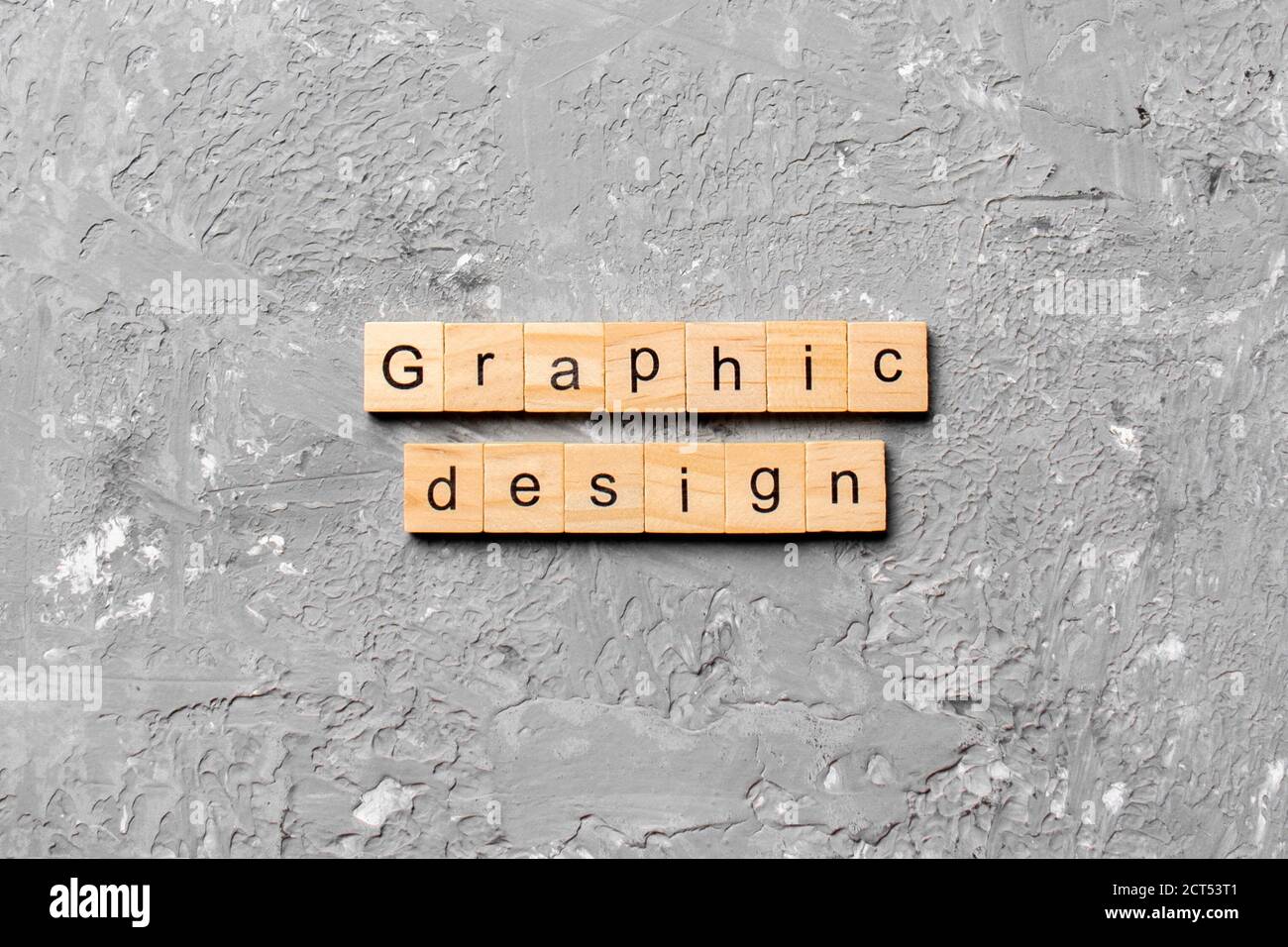 graphic design word written on wood block. graphic design text on ...