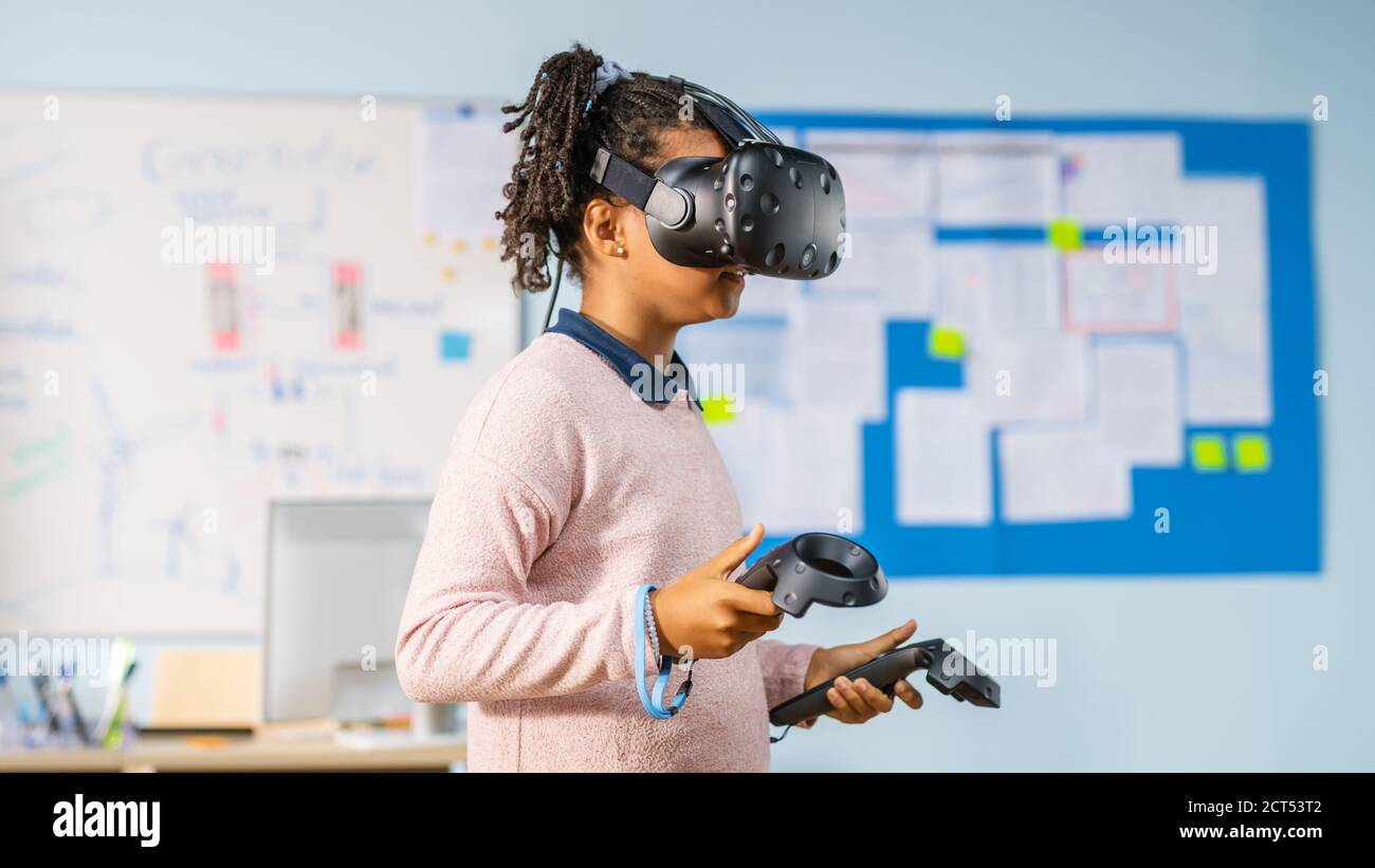 Elementary School Computer Science Class: Cute Girl Wearing Augmented ...