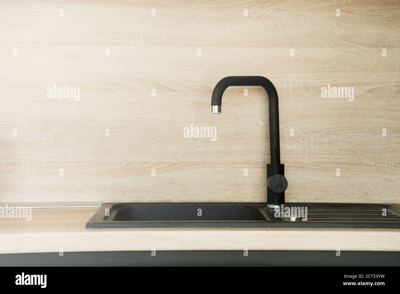 A nice, modern, grey sink. washstand. kitchen sink Stock Photo - Alamy