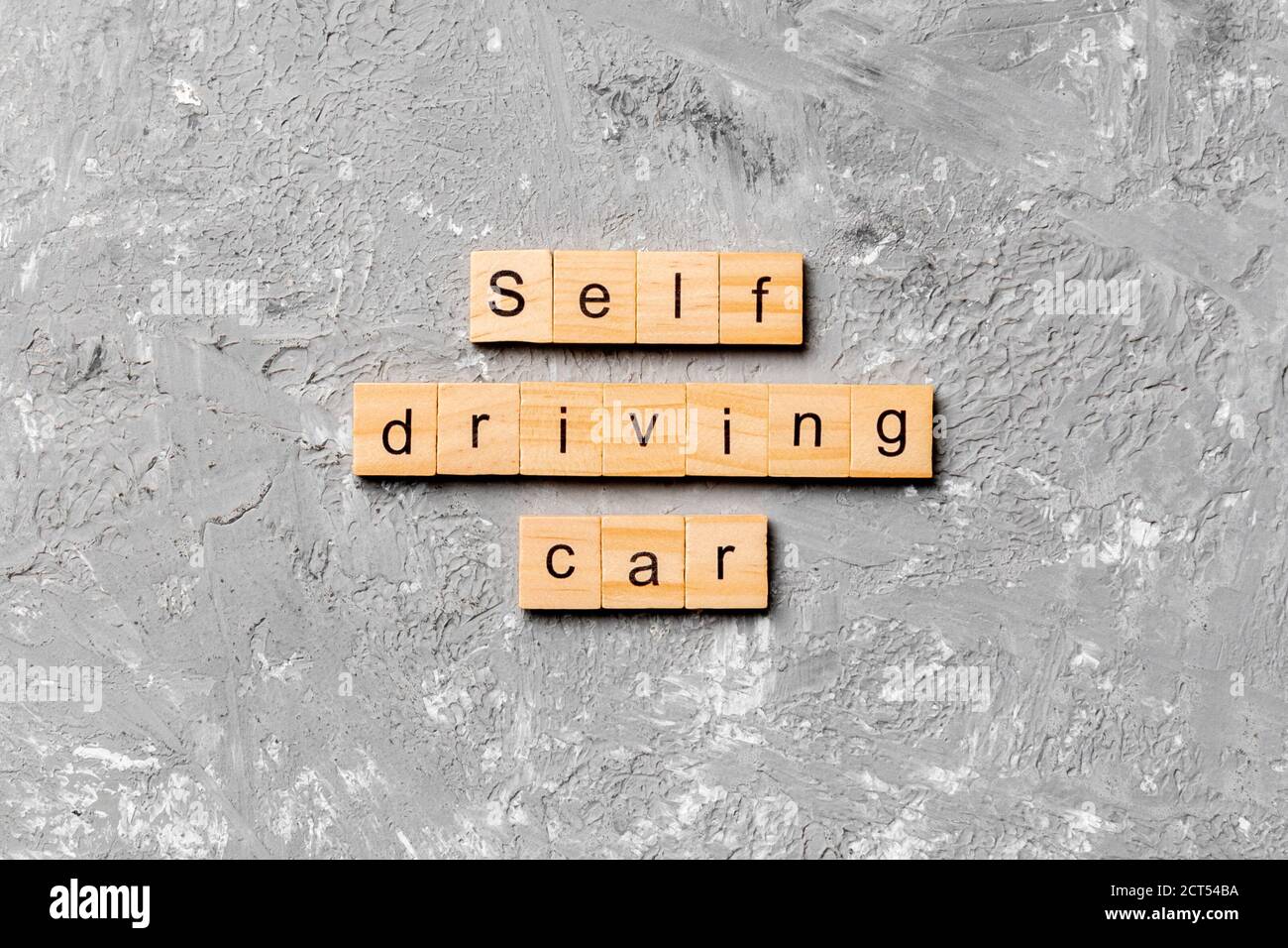 Self-driving car word written on wood block. Self driving car text on ...