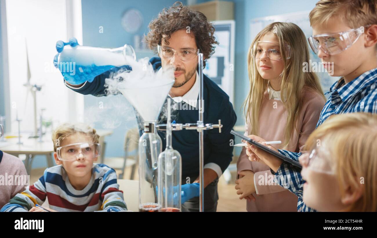 Elementary School Science Classroom: Enthusiastic Teacher Explains ...