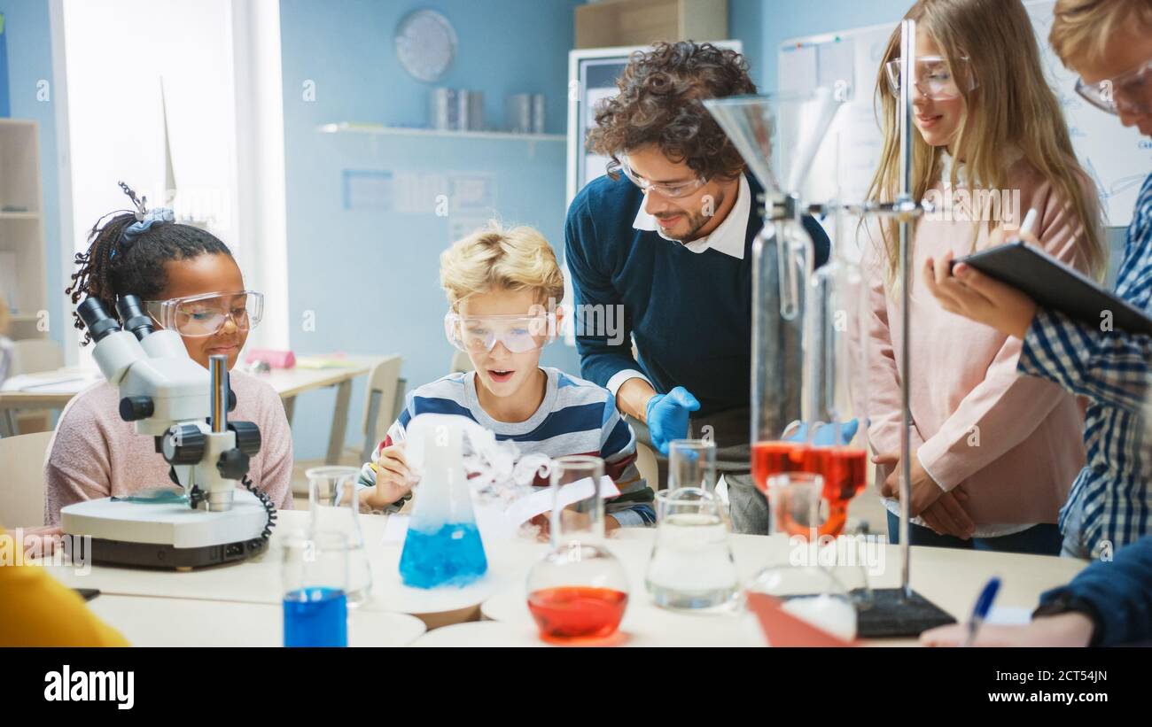 Elementary School Science Classroom: Enthusiastic Teacher Explains ...