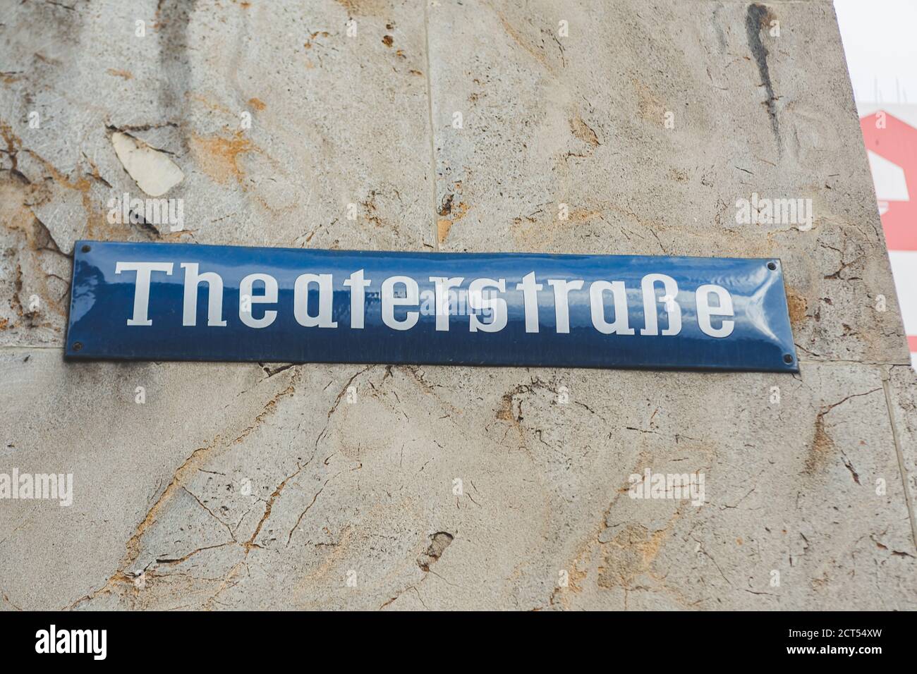 Theaterstrasse (eng. Theater street) street name sign in Wurzburg ...