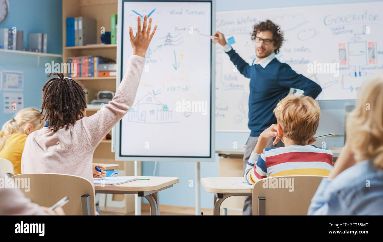Schoolgirl Raises Hand with an Answer, Enthusiastic Teacher Explains ...