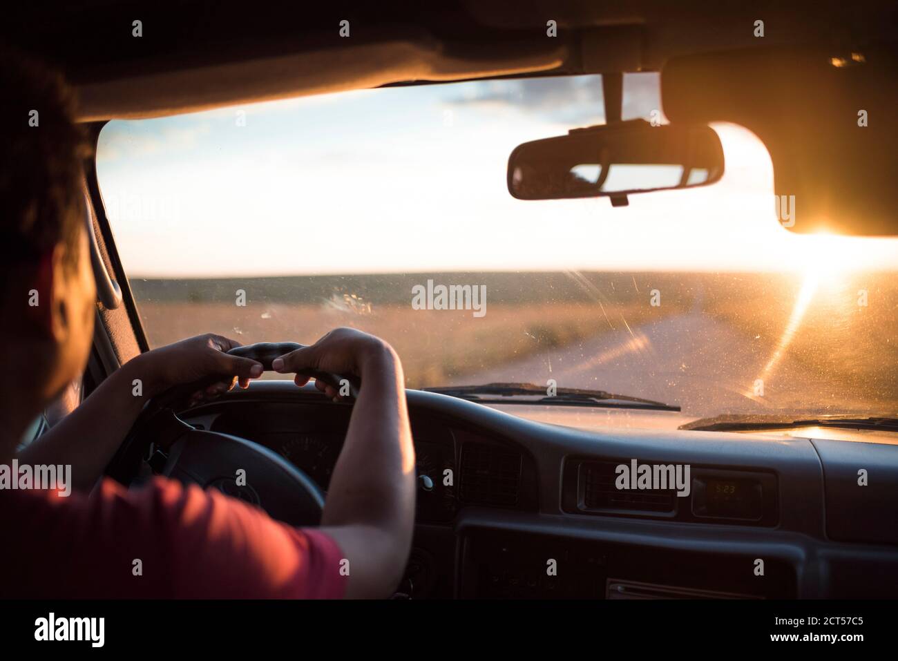 Driving on RN7 (Nationale Route 7) at Isalo National Park at sunset ...