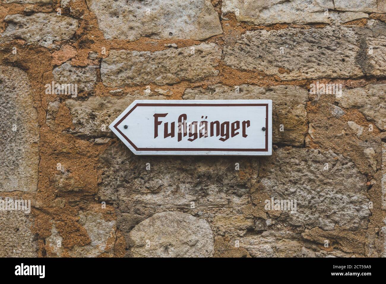 Directional sign for pedestrians on a street in a german town (literal ...