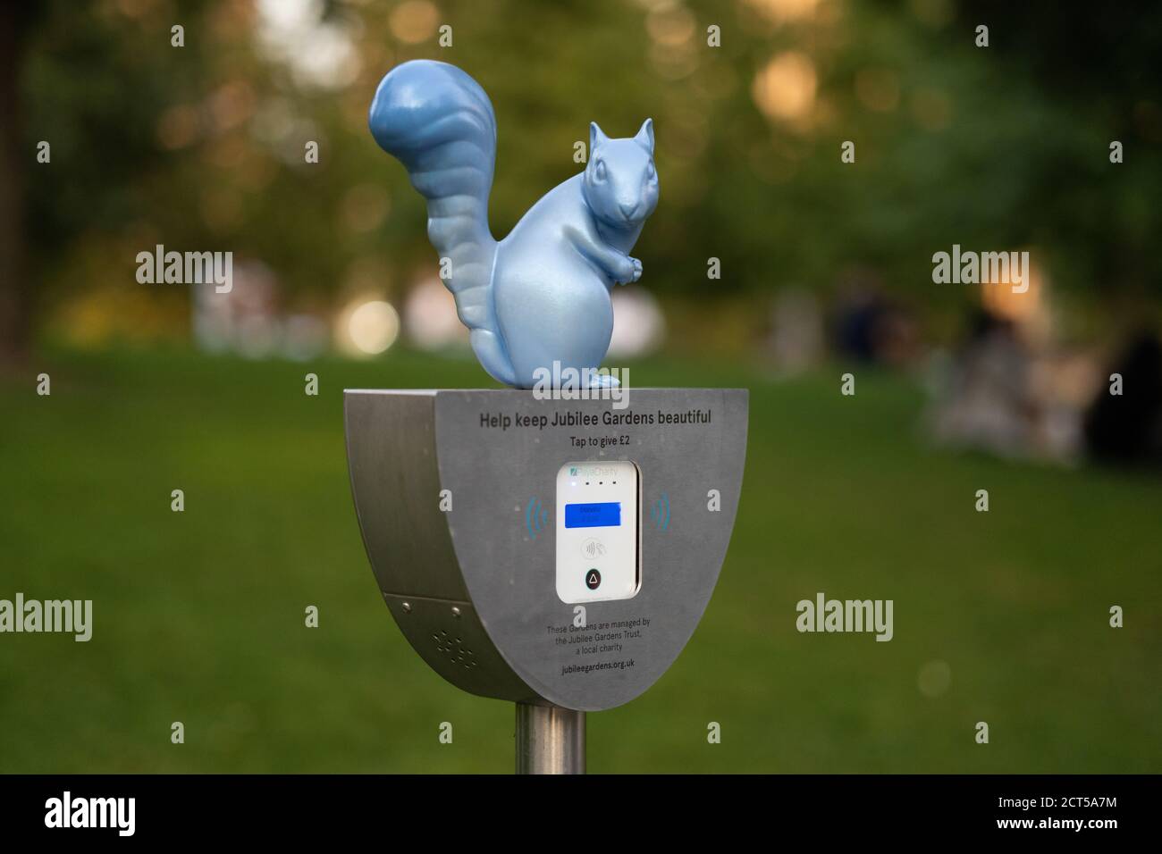 Jubilee Gardens squirrel donation tower Stock Photo - Alamy
