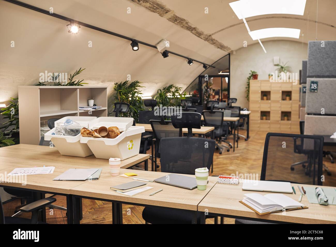 Wide angle background image of two waste sorting containers on desk in ...