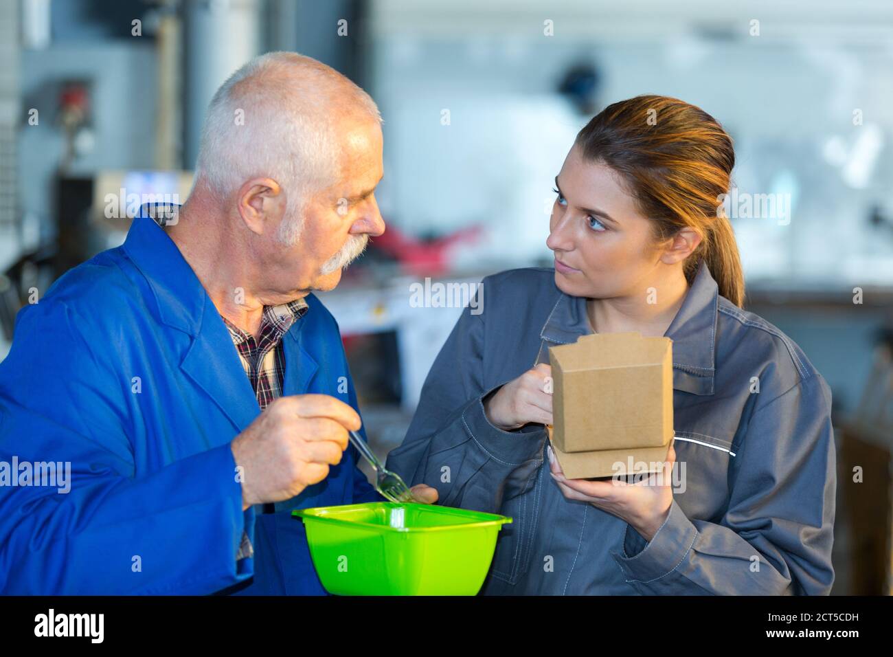 warehouse workers eating lunch Stock Photo - Alamy