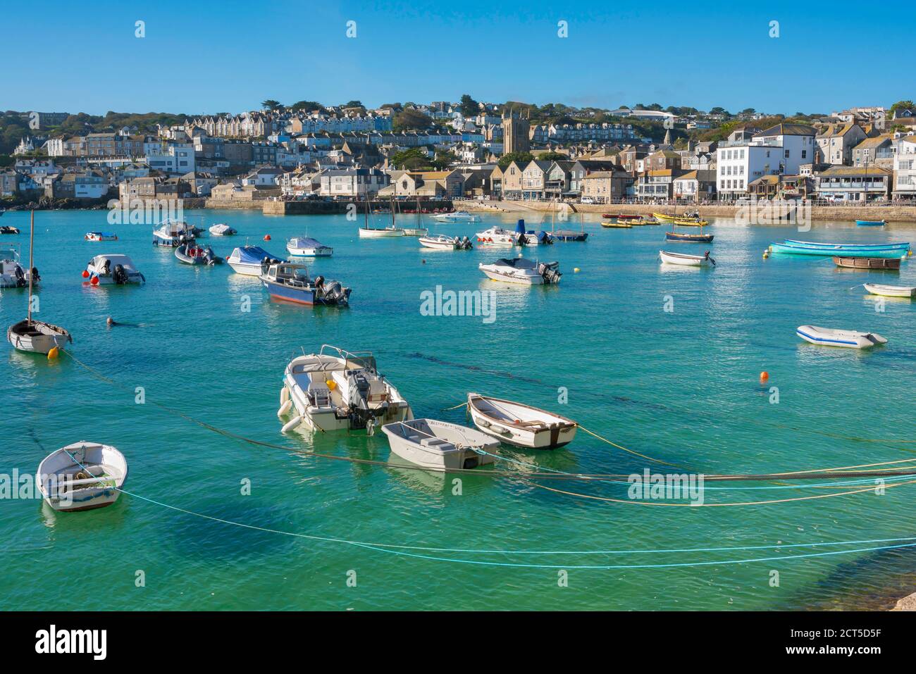 Cornish riviera, view in summer of fishing boats moored in the harbour ...