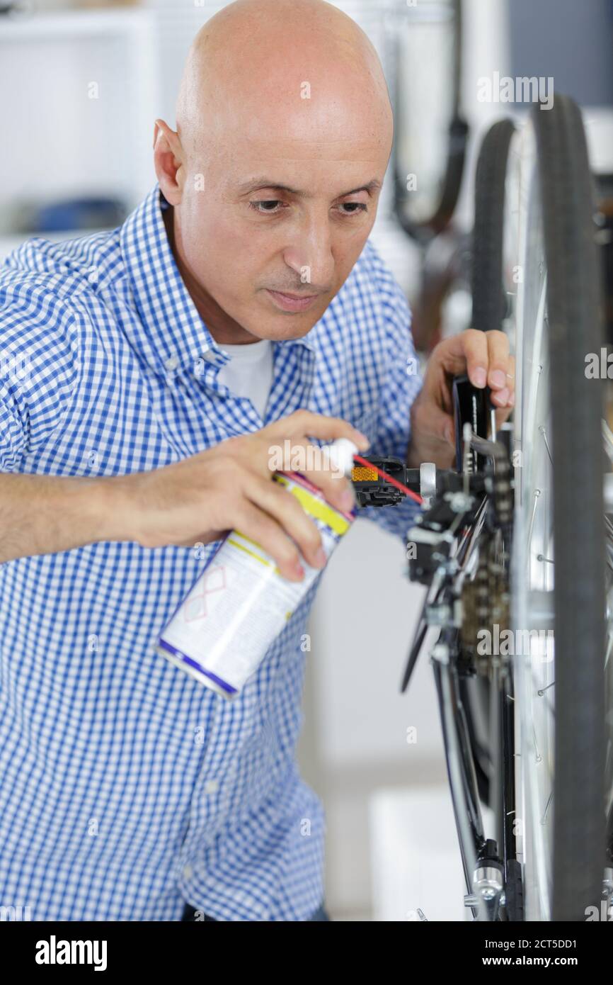 Male Oiling Bike High Resolution Stock Photography and Images - Alamy