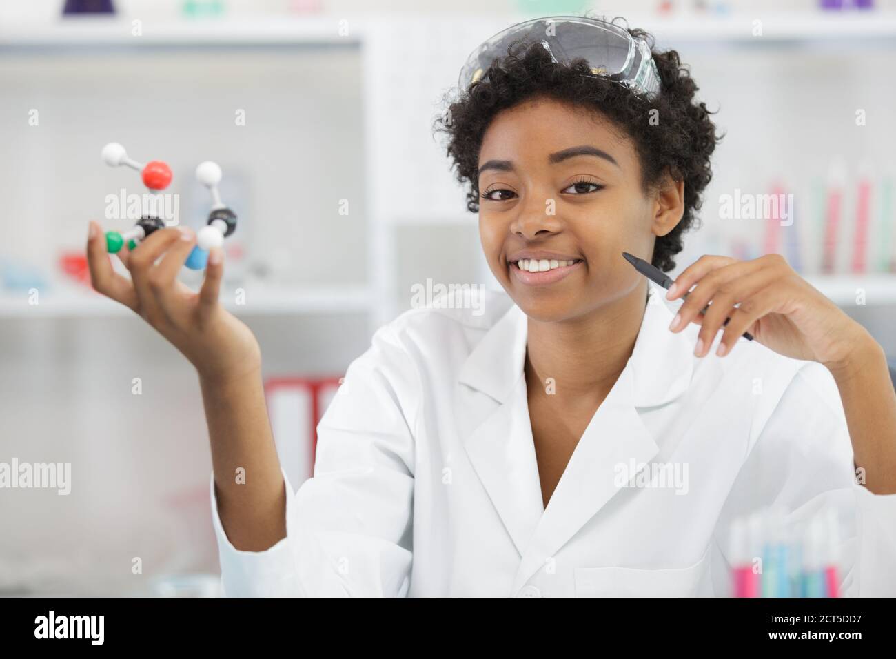 Woman standing looking dna hi-res stock photography and images - Alamy